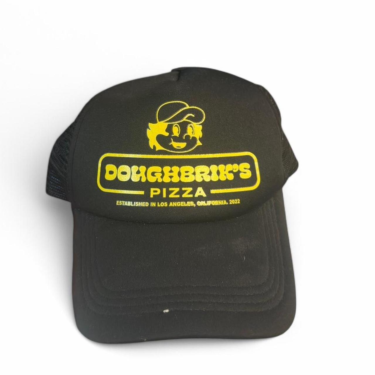 Black and yellow Doughbriks Pizza trucker hat... | Depop