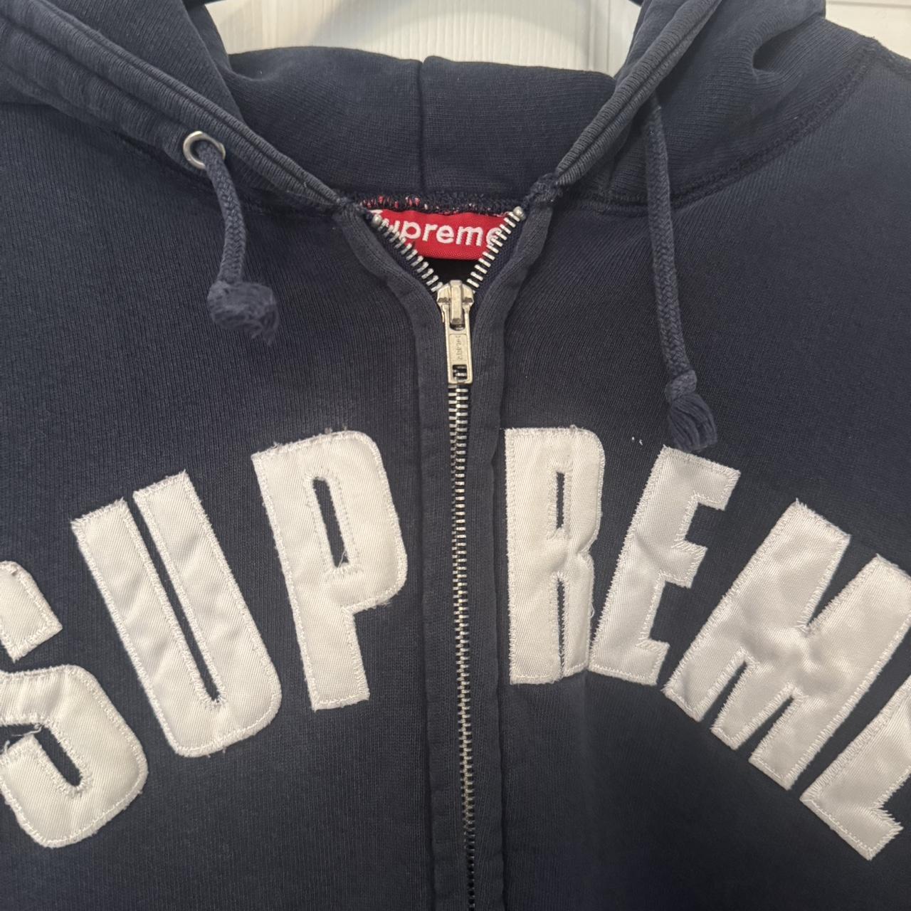navy blue Supreme zip up hoodie. no size but fits... - Depop
