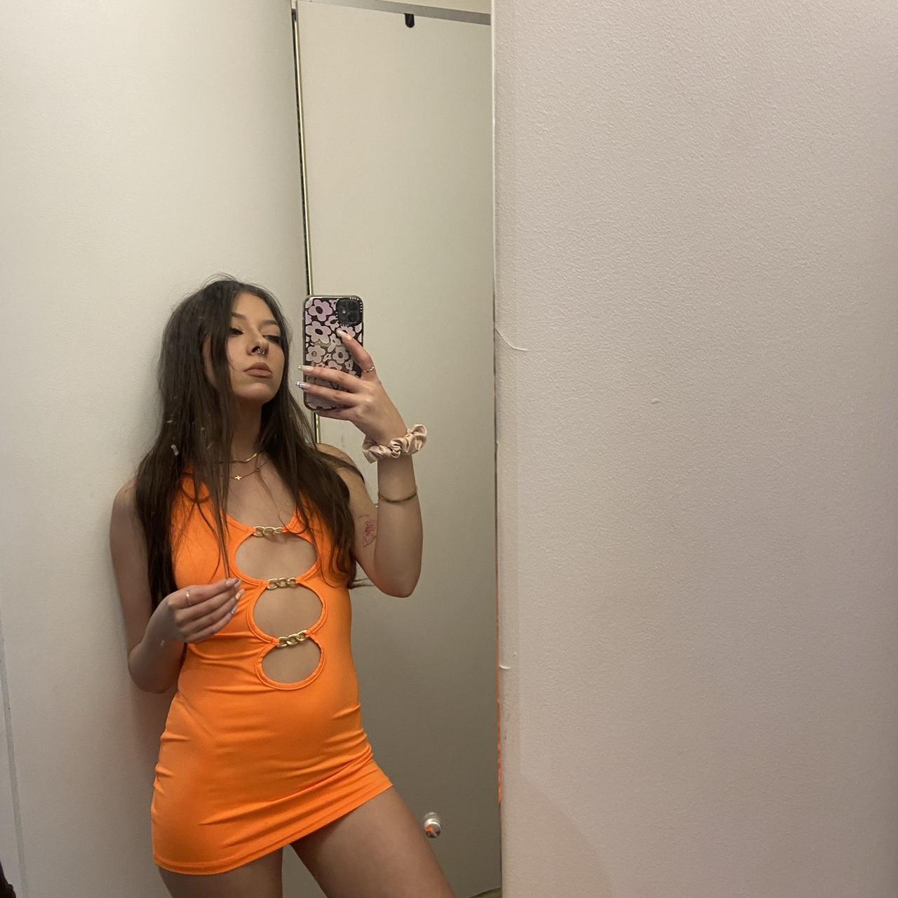 Bright orange mini dress with gold detailing in the... - Depop
