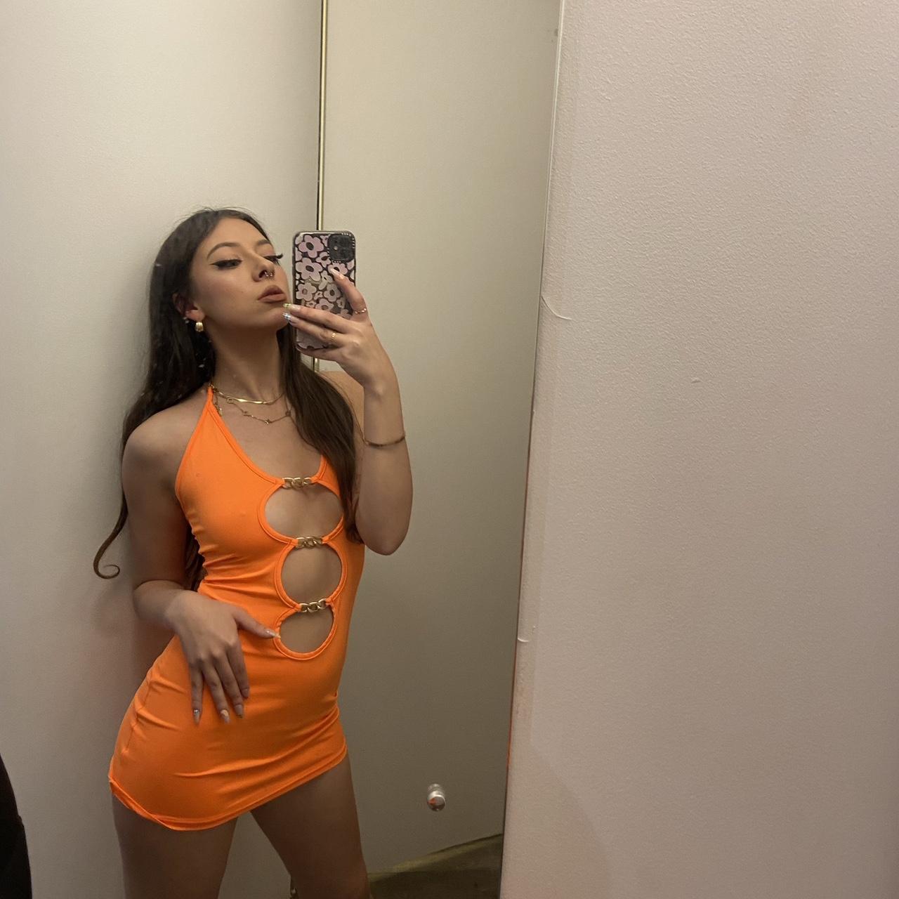 Bright orange mini dress with gold detailing in the... - Depop