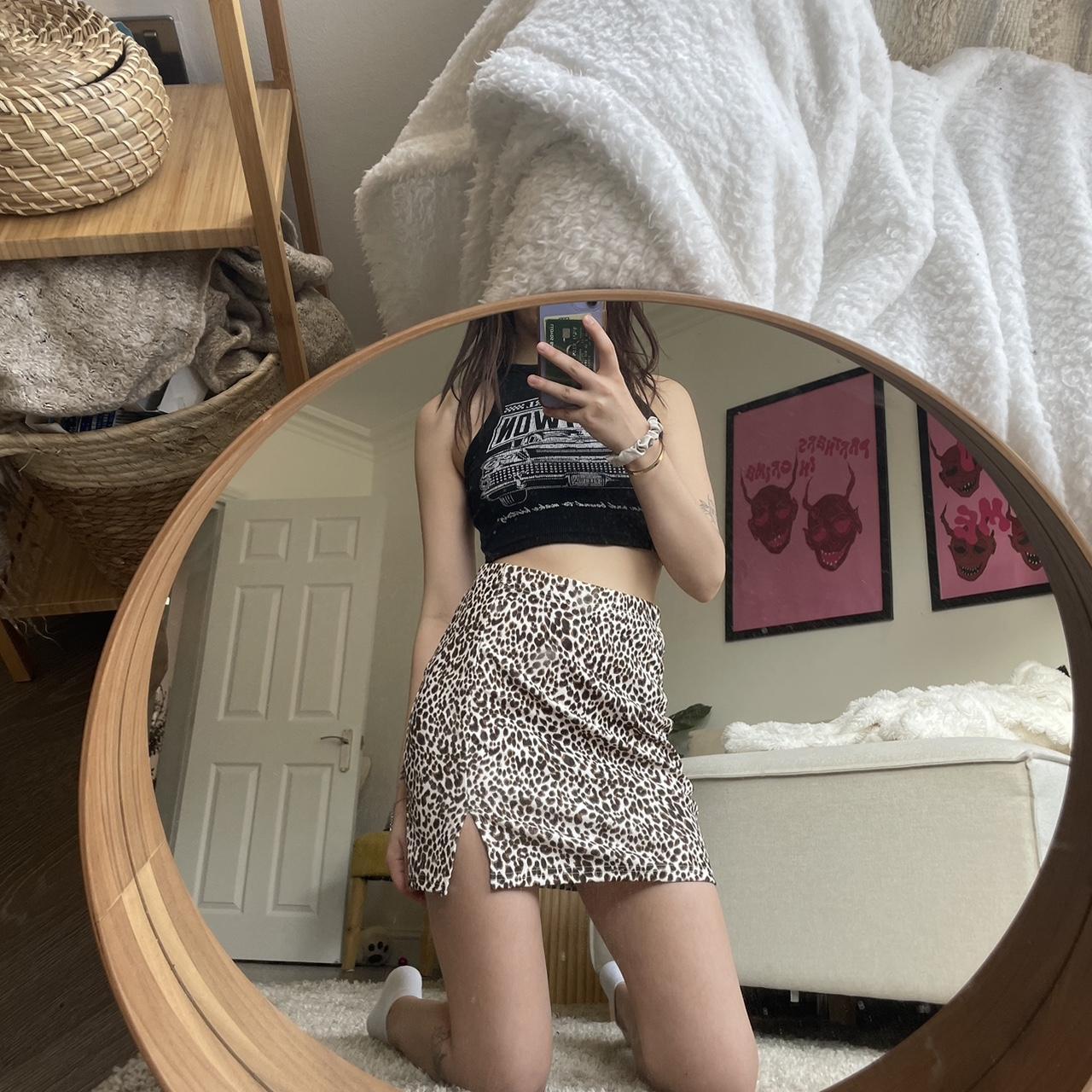 Leopard print mini skirt with a slit from Shein in a... - Depop