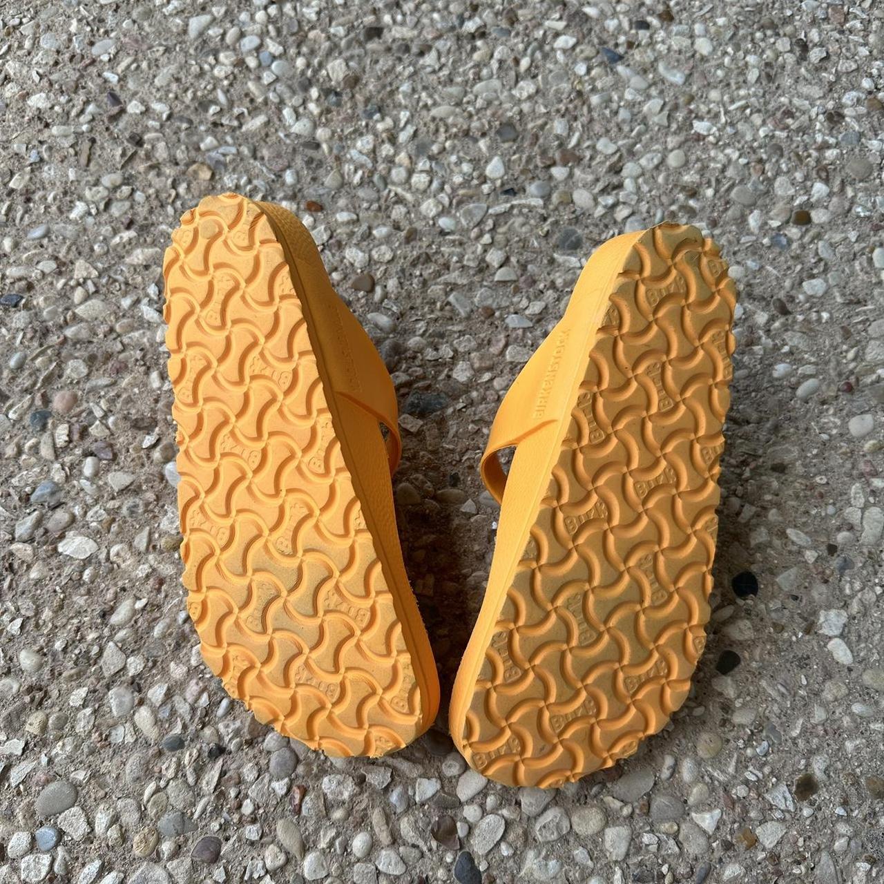 Orange Birkenstock rubber waterproof sandals... - Depop