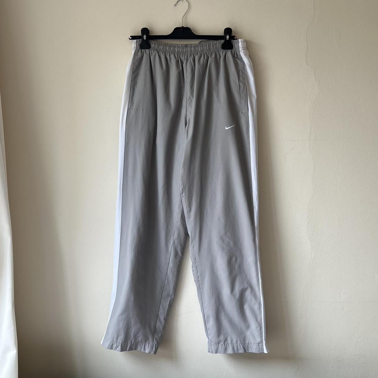 Nike tracksuit bottoms Size small Could fit a medium... - Depop