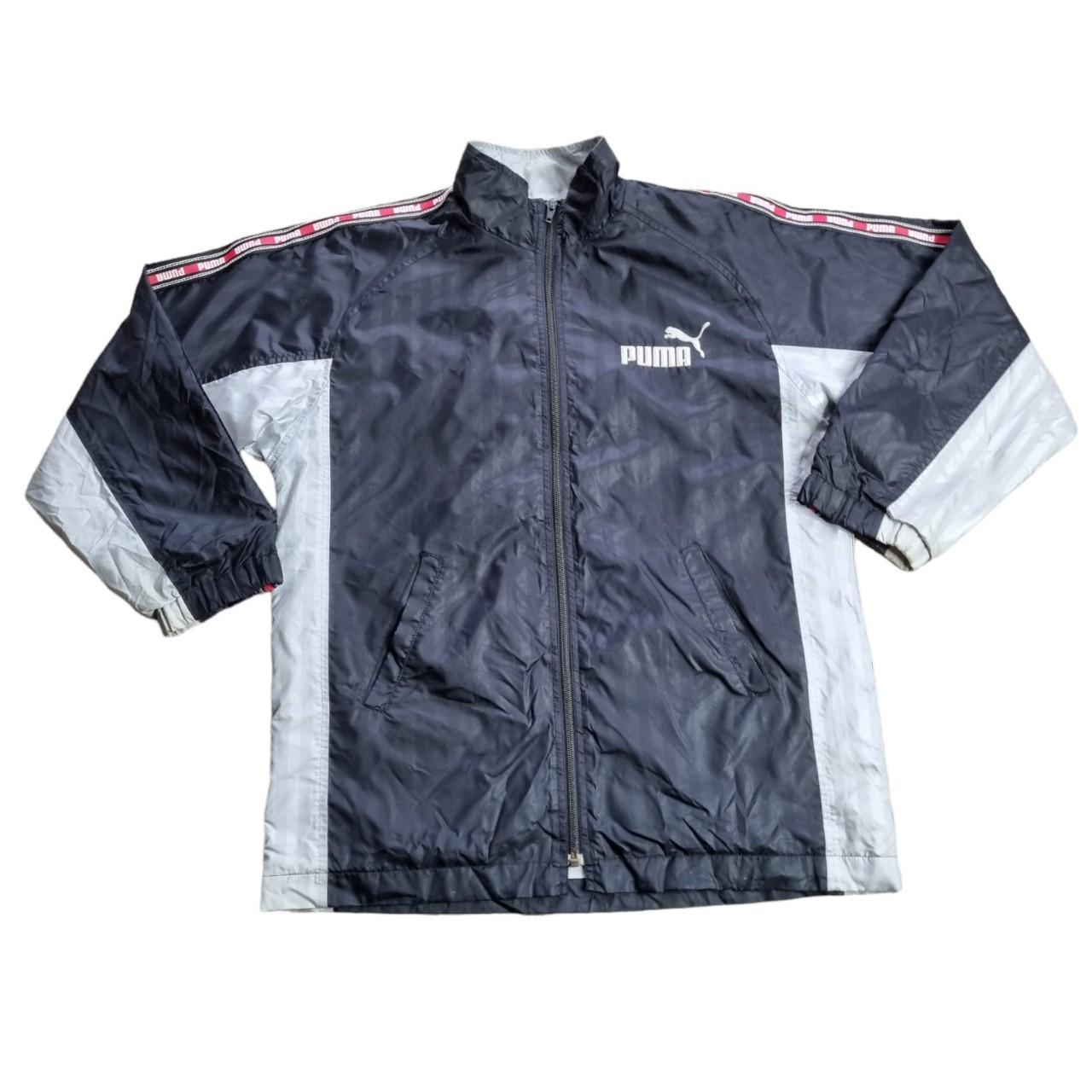 Black and Grey Puma zip up jacket with red logo... - Depop