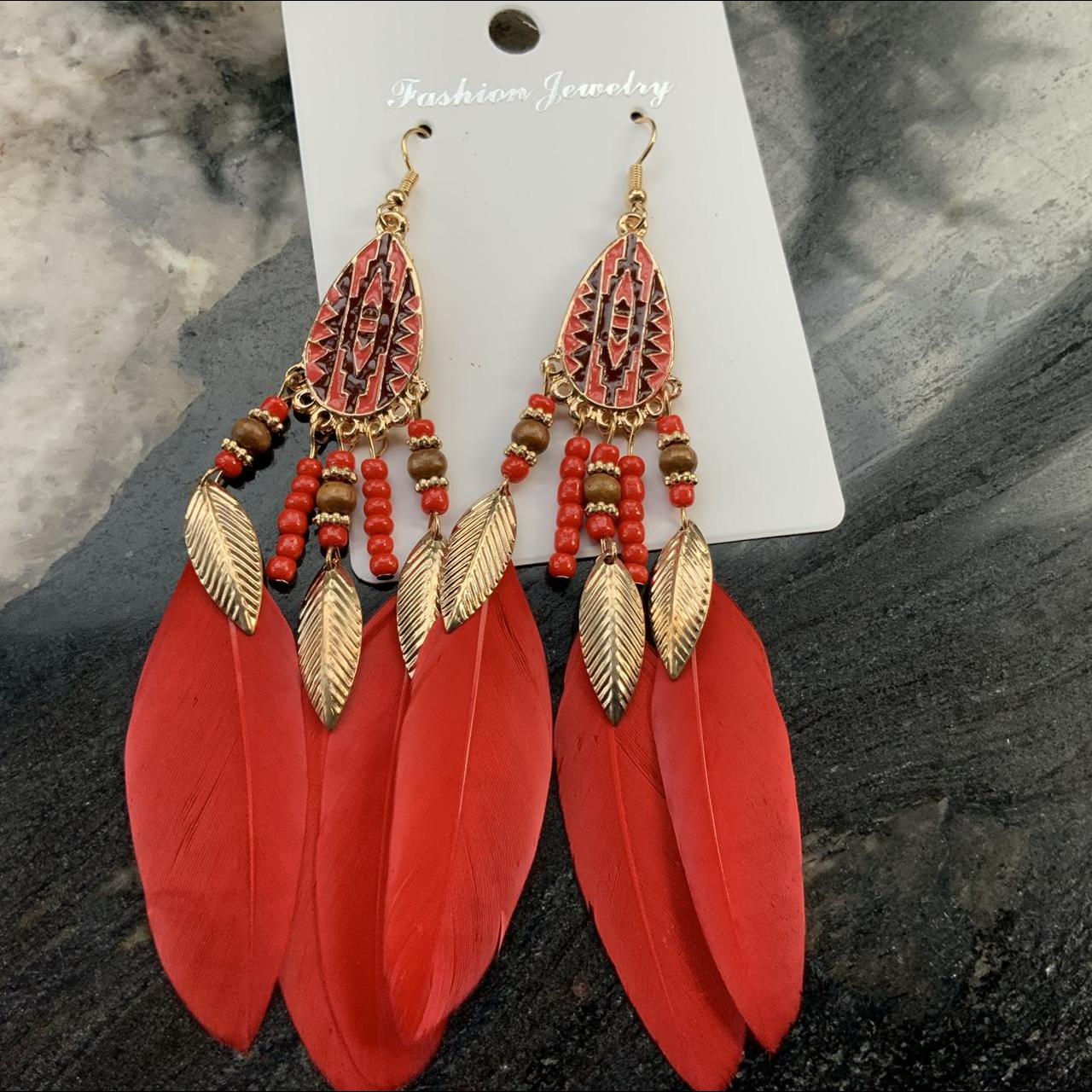 Large red feather Statement gold metal ... - Depop