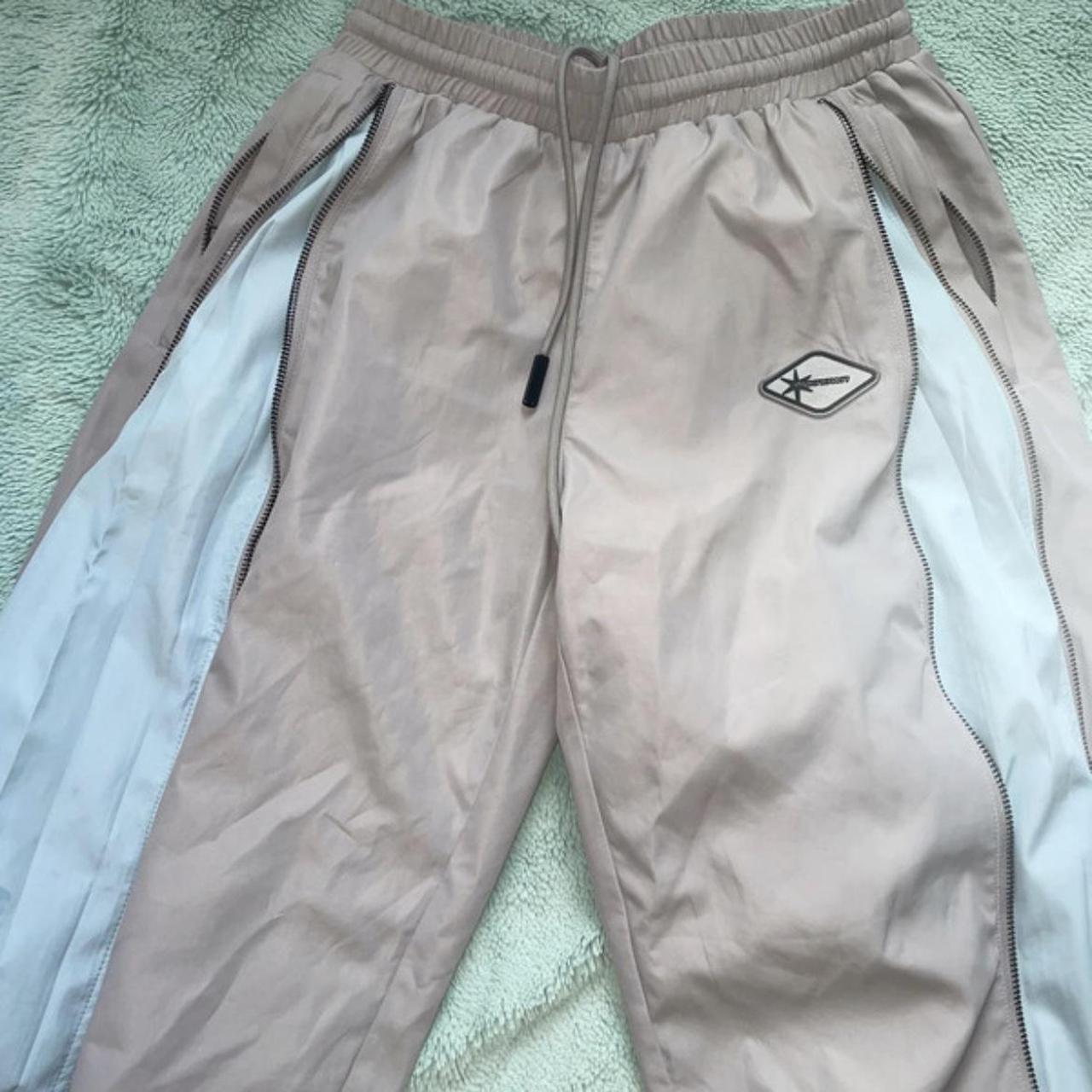 Unknown London beige/ blue track pants Size small... - Depop