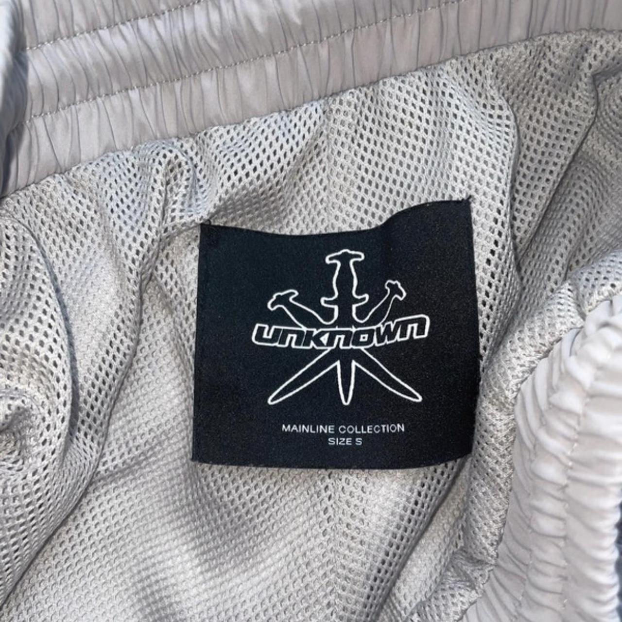 Unknown London beige/ blue track pants Size small... - Depop