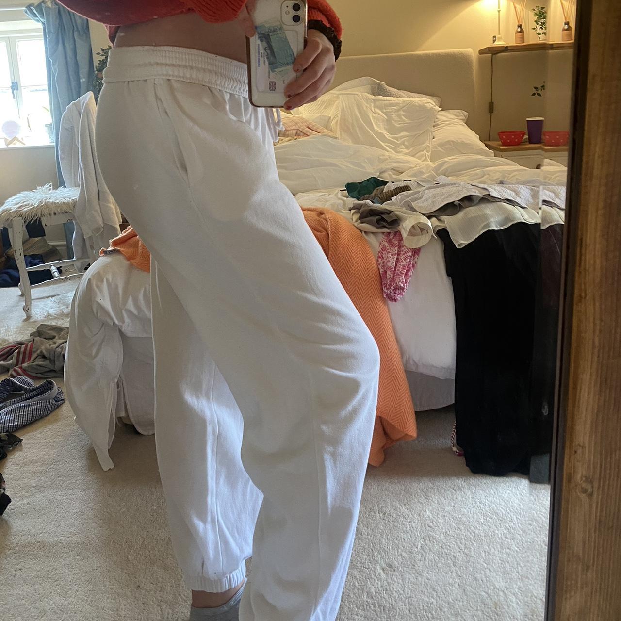 White baggy trackies Size medium shown on a size... - Depop