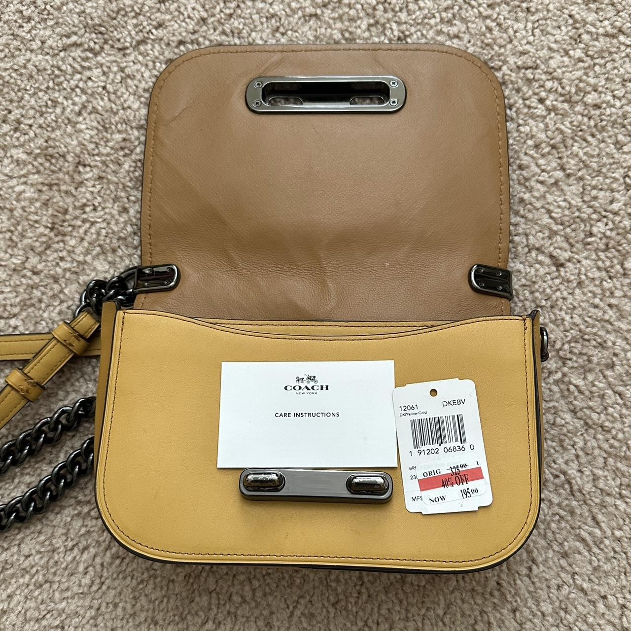 yellow coach bag - a few marks on the front of it... - Depop