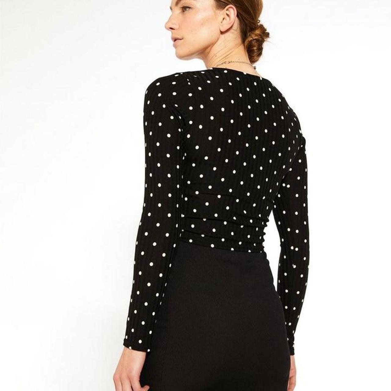 Black spotty long sleeve top with ruched middle So... - Depop
