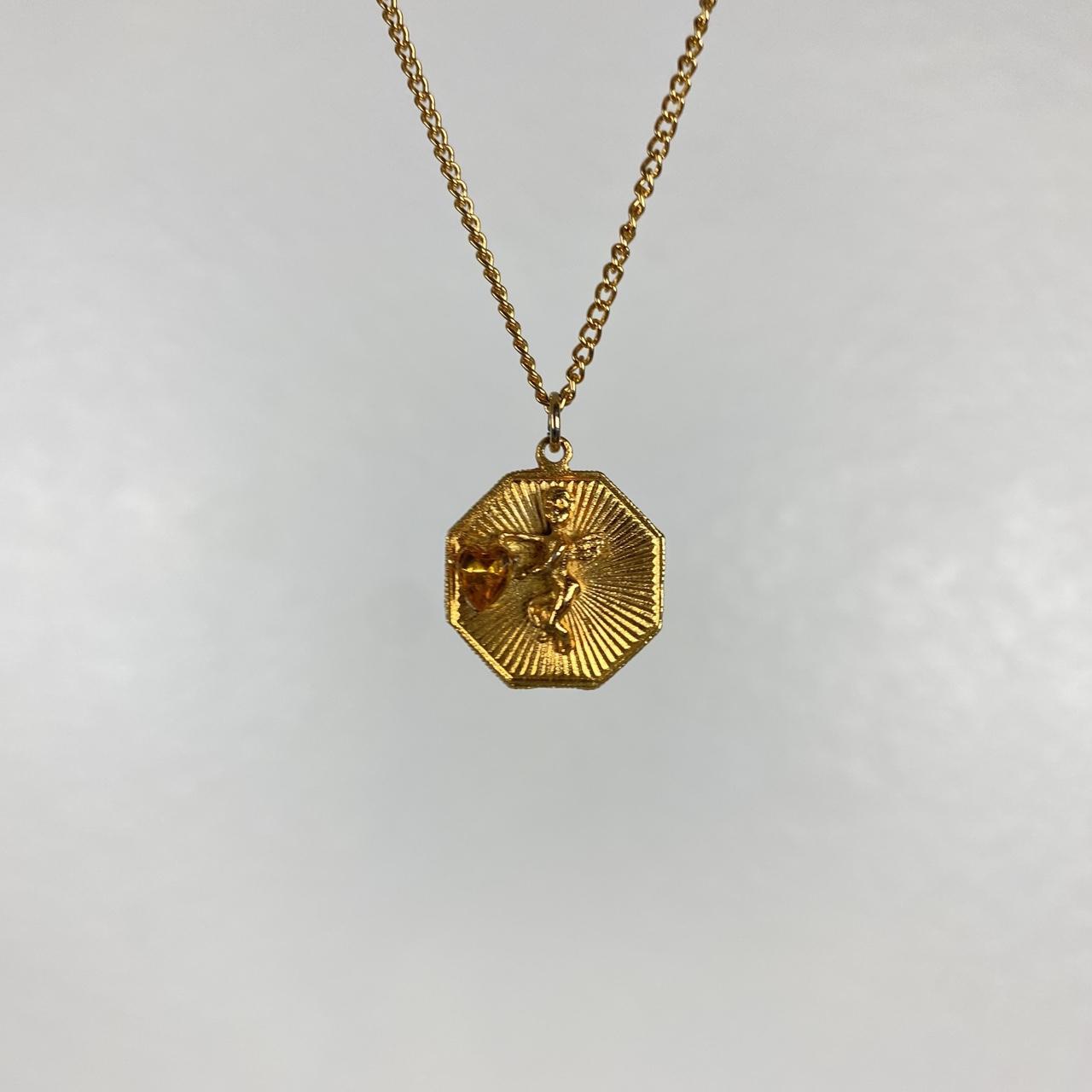 Cute little gold Cupid orange amber heart rhinestone... - Depop