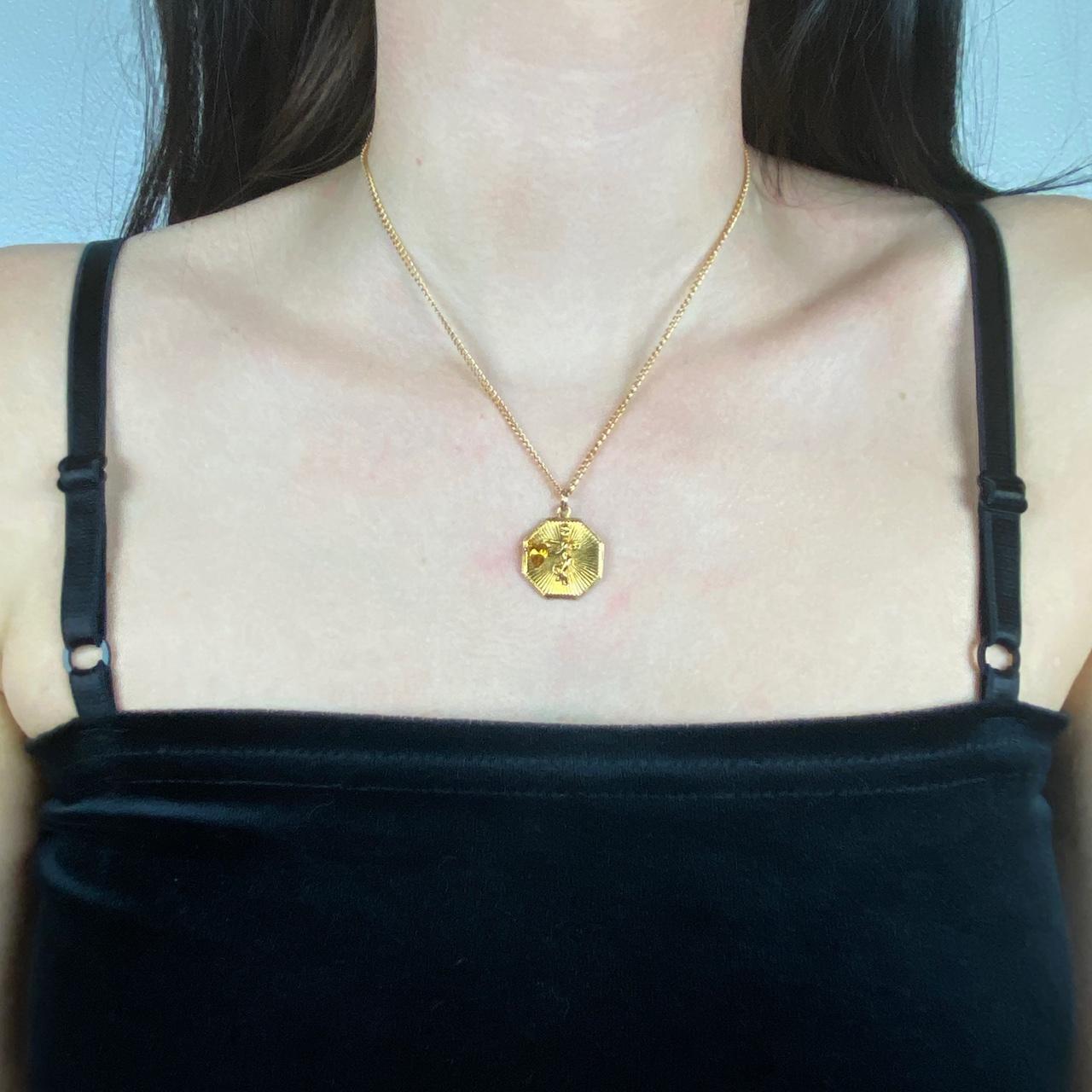 Cute little gold Cupid orange amber heart rhinestone... - Depop