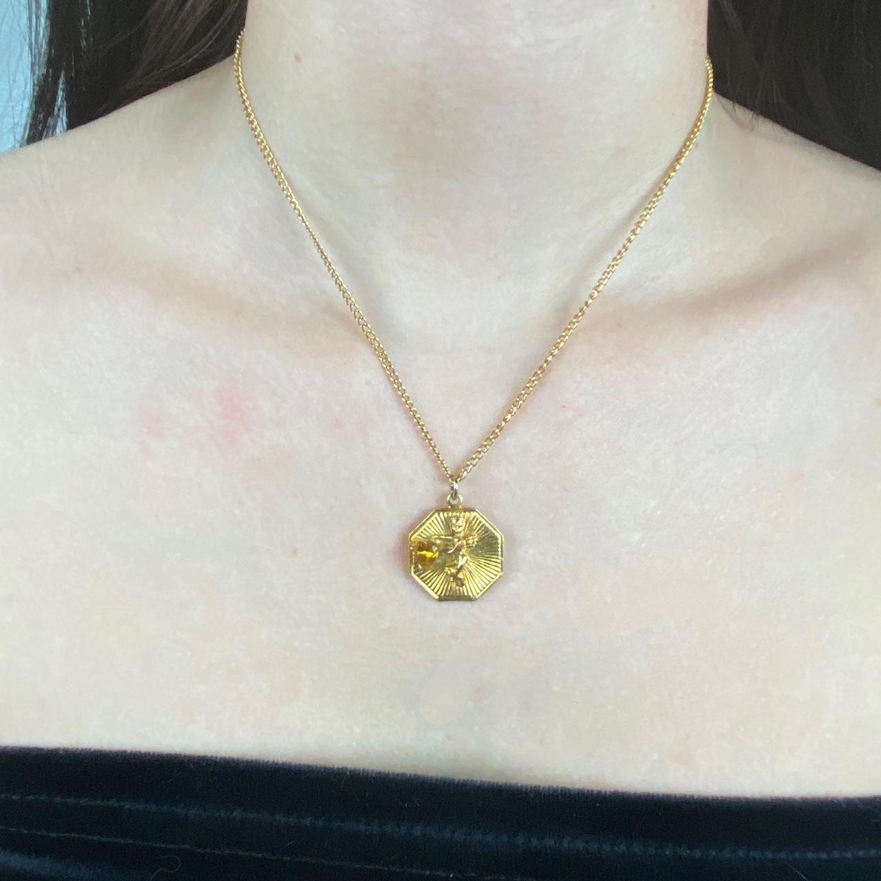 Cute little gold Cupid orange amber heart rhinestone... - Depop