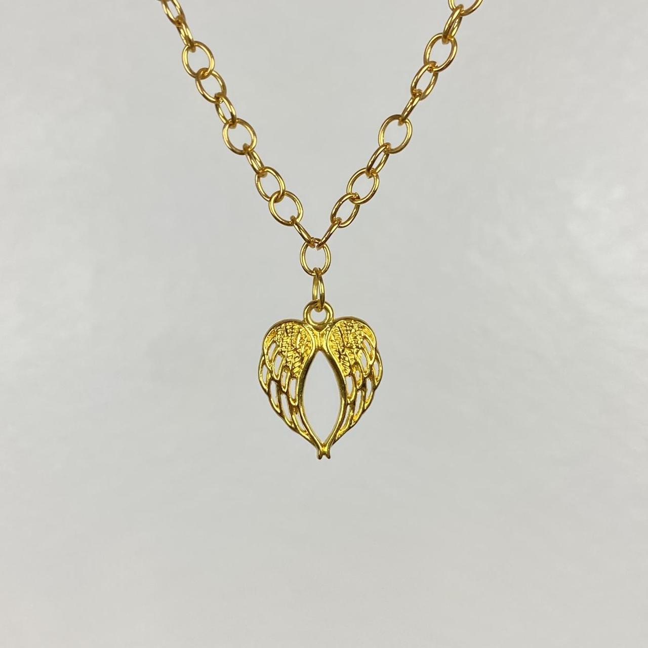 Cute gold vintage y2k angel wings pendant necklace.... - Depop