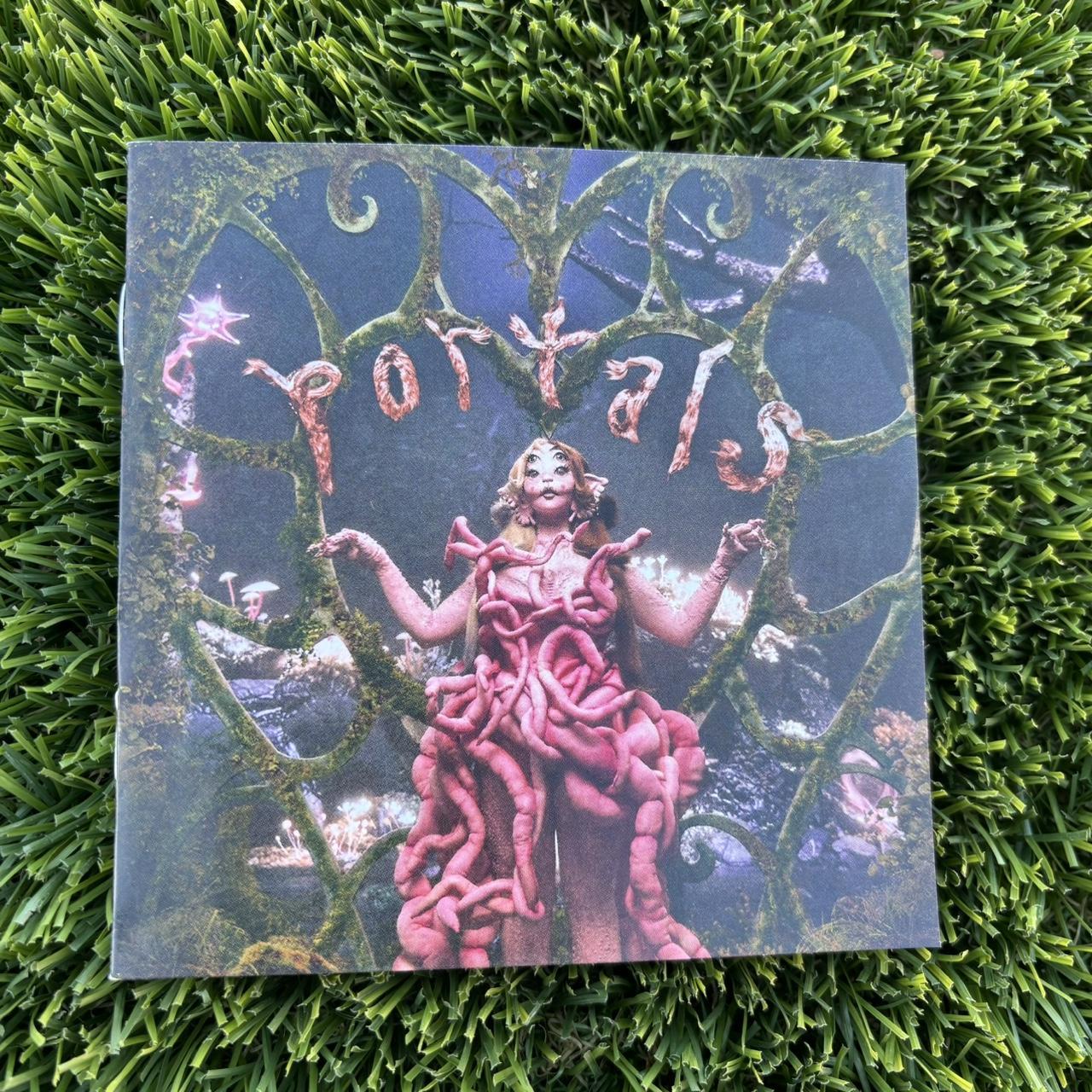 Portals in store / indie exclusive CD insert... - Depop