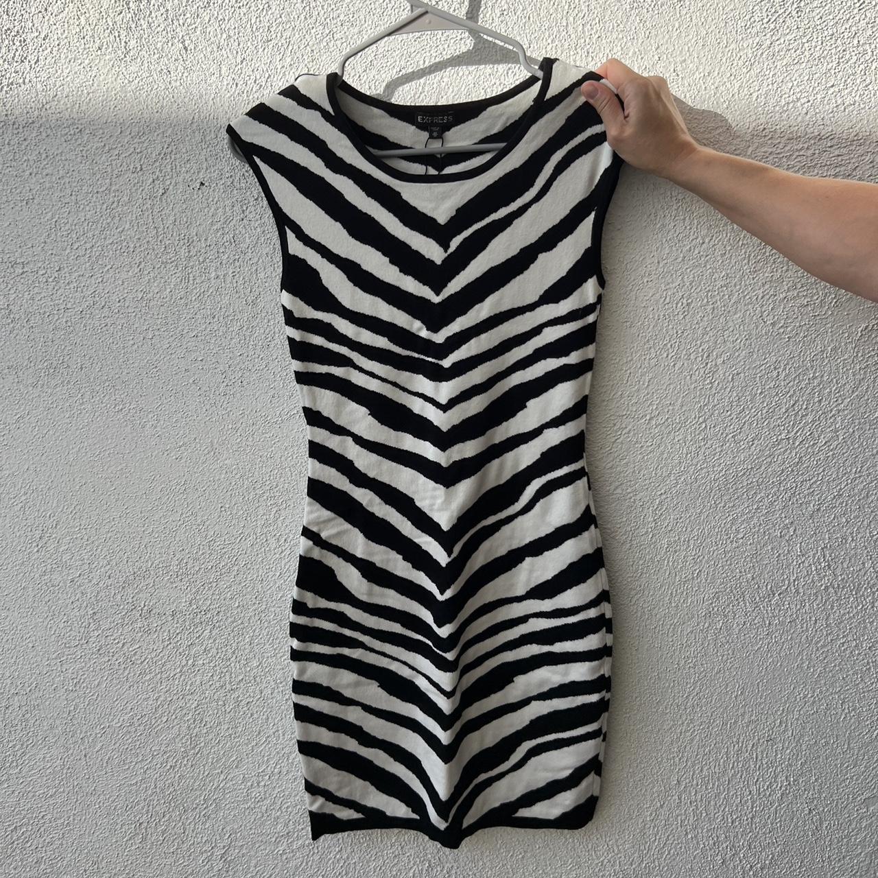 Zebra print body hugging dress! Super soft and... - Depop