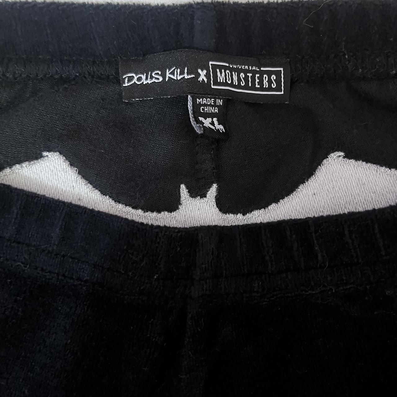 Cute black sweatpants from Dolls Kill X Universal... - Depop
