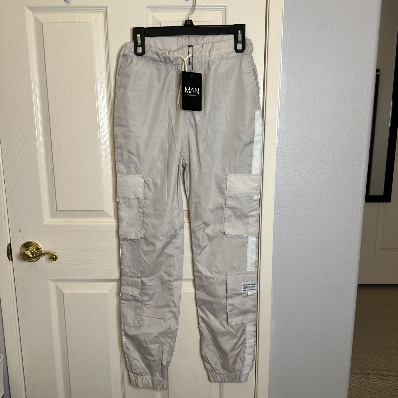 cream boohoo slim fit shell cargo trousers size... - Depop