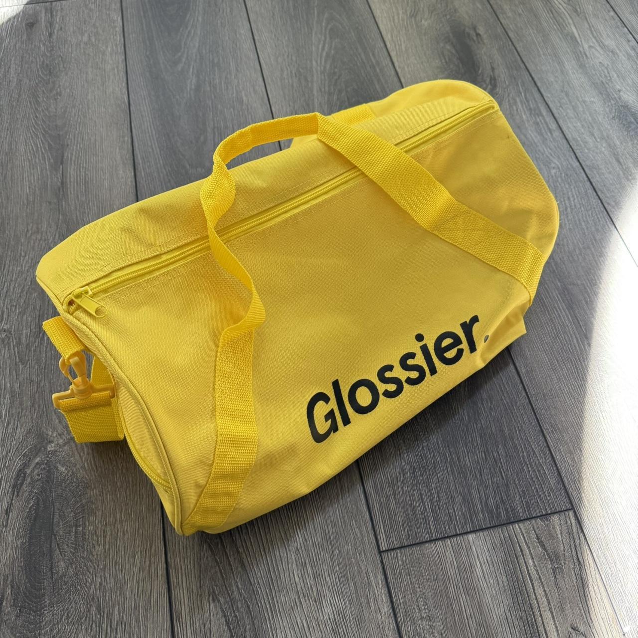 Glossier Yellow Duffle Bag good condition, marks... | Depop