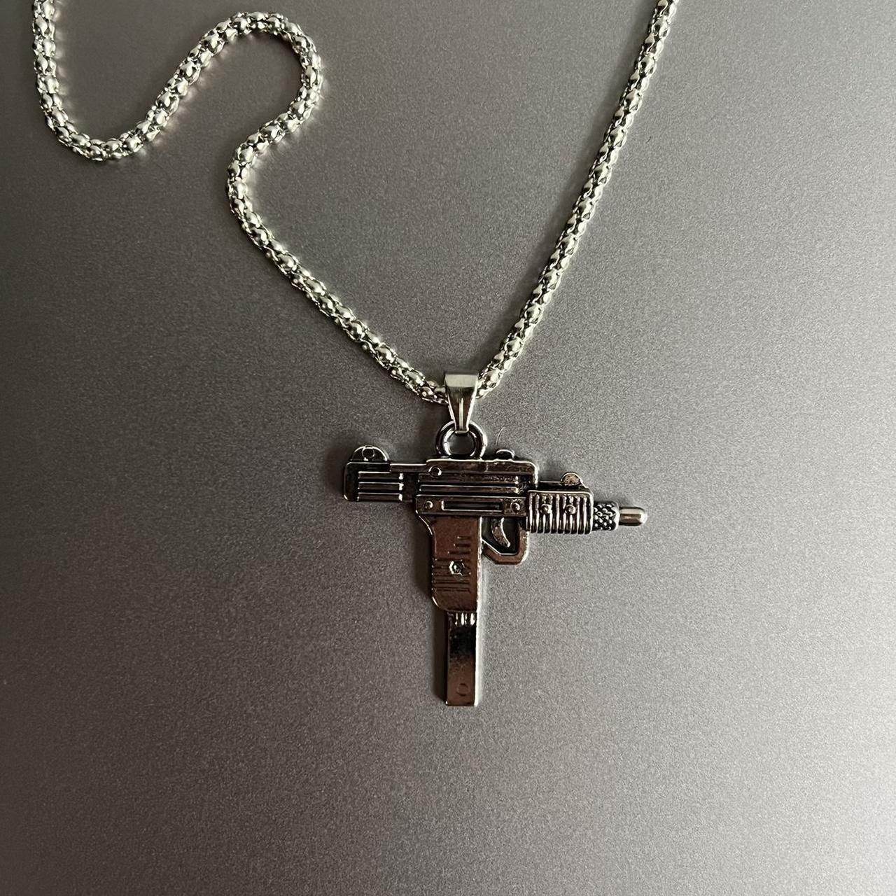 y2k 2000s heavy metal gothic gun pendant silver mini... - Depop