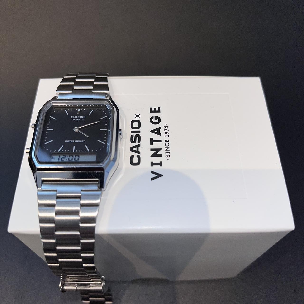 Casio 'Classic' Silver and Black Stainless Steel... - Depop