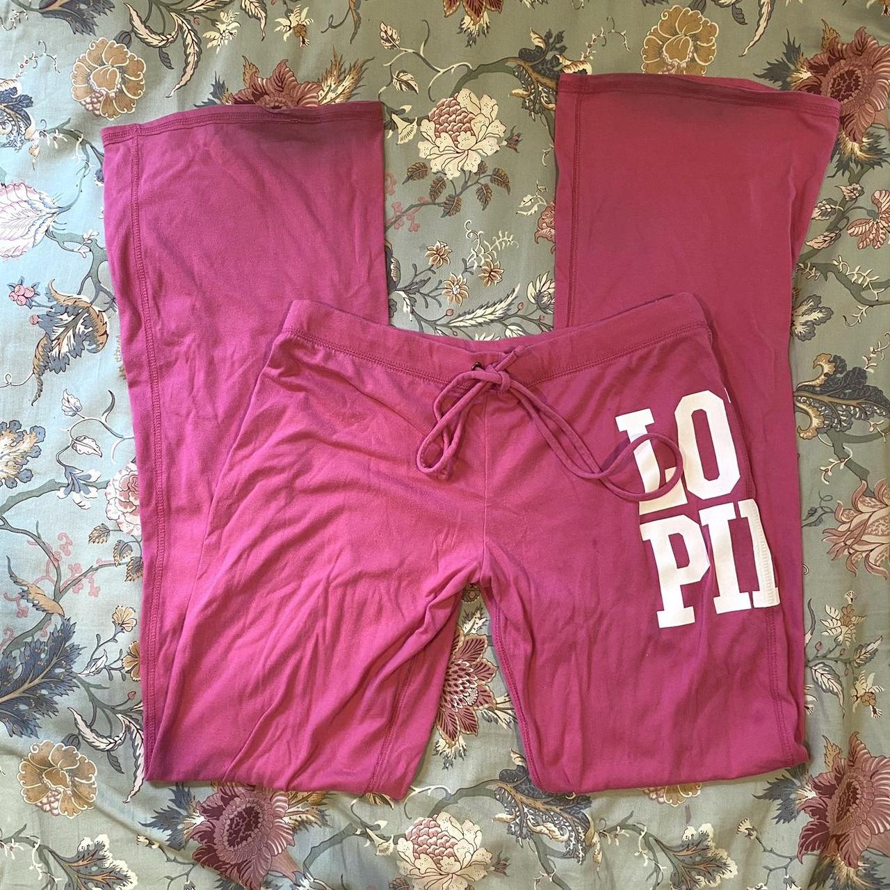 Love pink low rise flare pink sweatpants with... - Depop