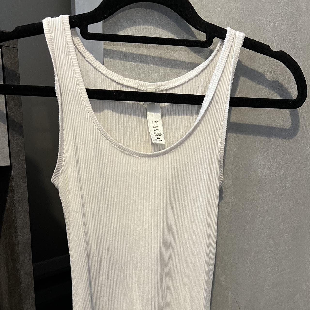 Skims white tank top. Never worn, perfect condition,... - Depop