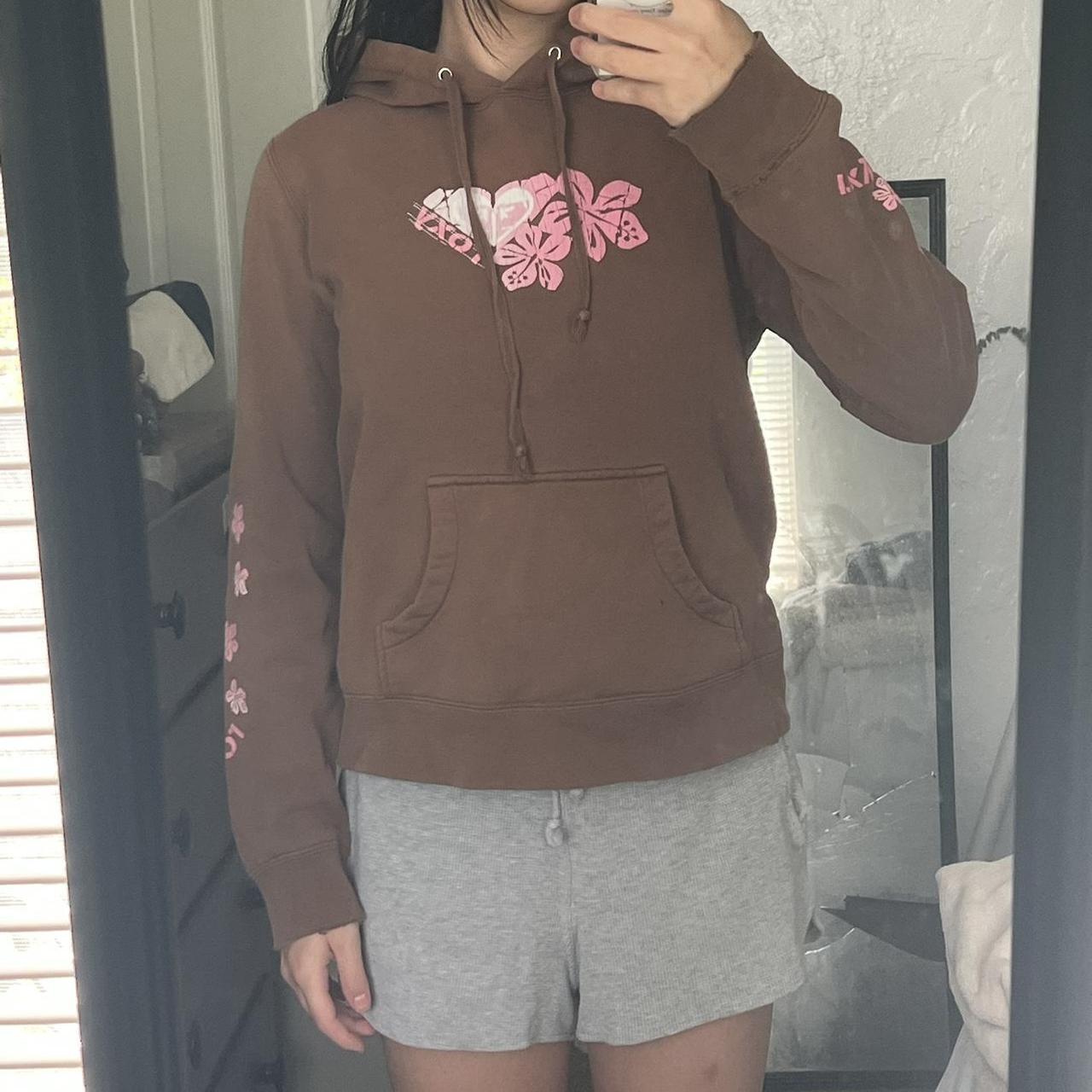 Brown Roxy hoodie. Pink logo. Pink flowers+logo on... - Depop