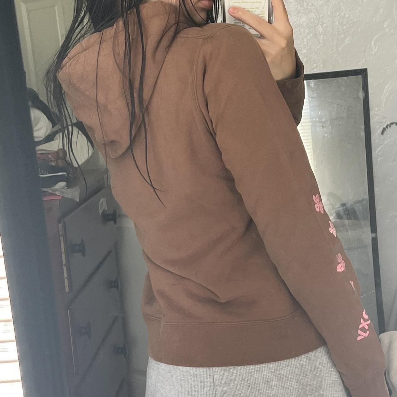 Brown Roxy hoodie. Pink logo. Pink flowers+logo on... - Depop