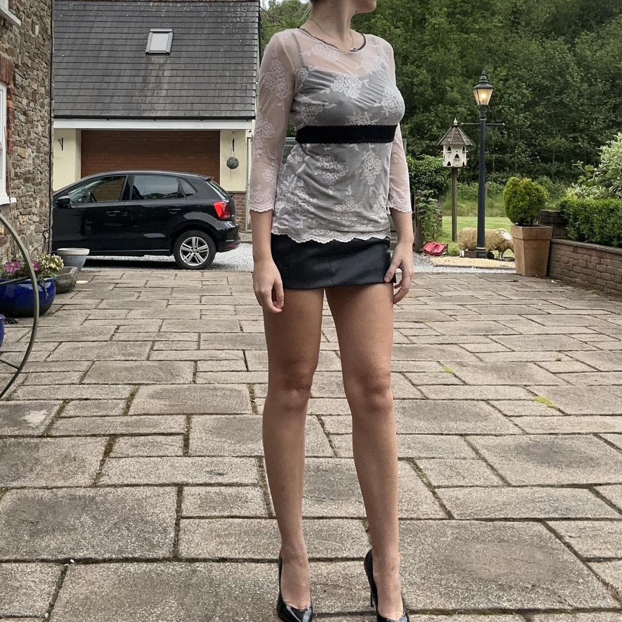 Light pink lace top with black vest... - Depop