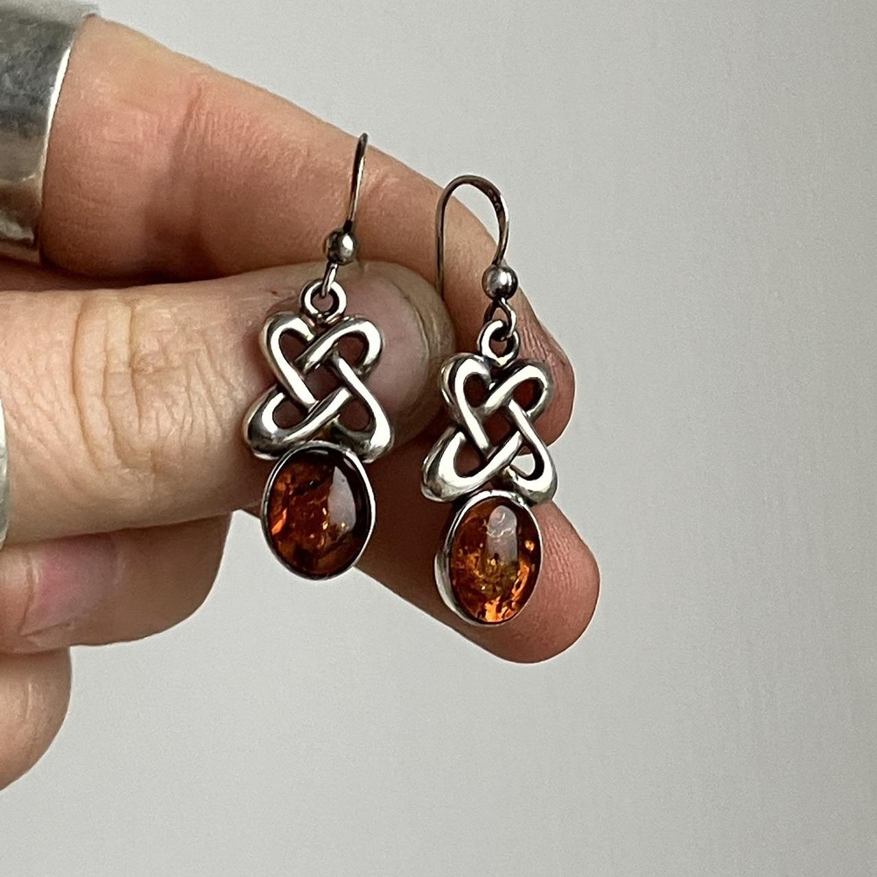 A0663 Beautiful sterling silver and amber Celtic... - Depop