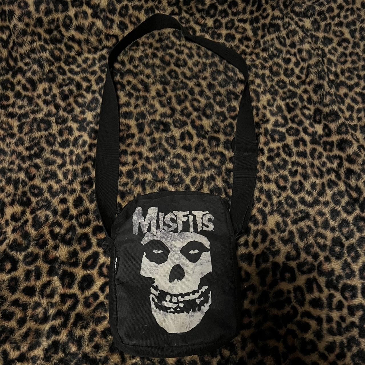 Misfits adjustable bag a couple of tiny holes due to... - Depop
