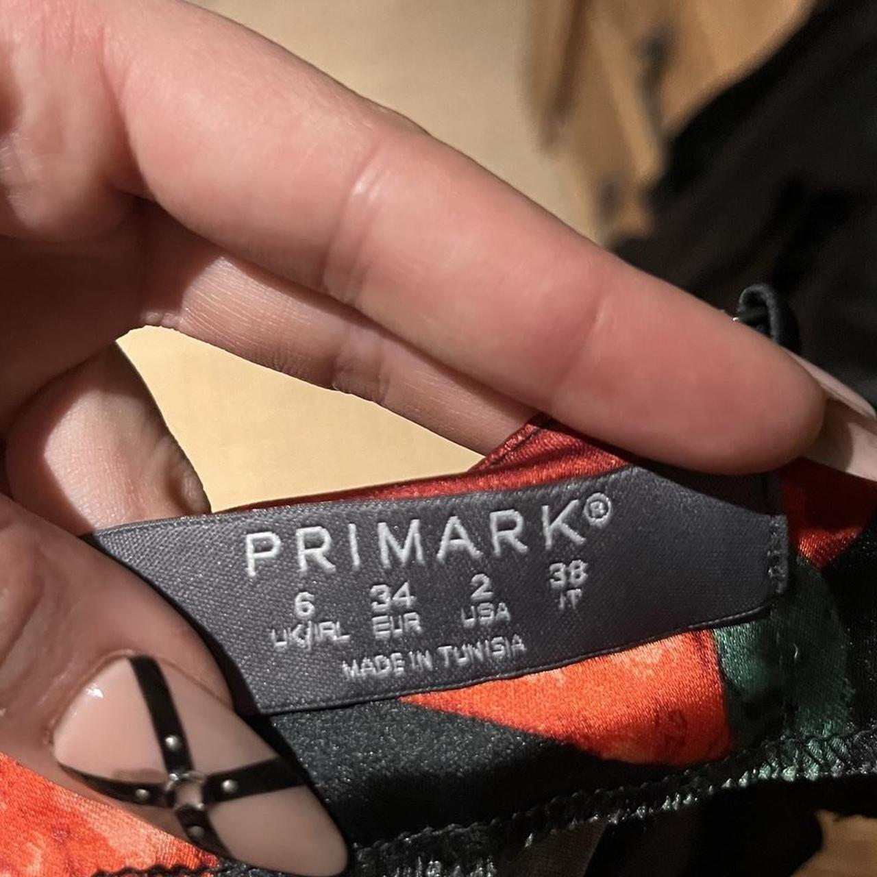 primark red rose print dress on black background,... - Depop