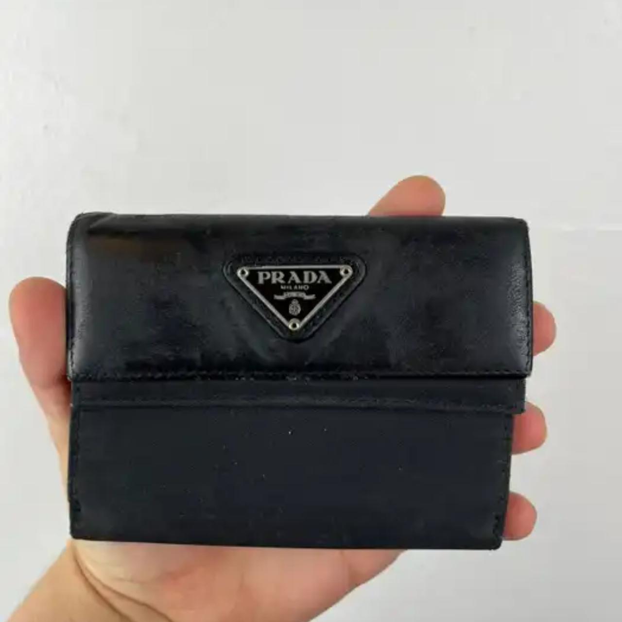 prada wallet In good condition some wear Offers... - Depop