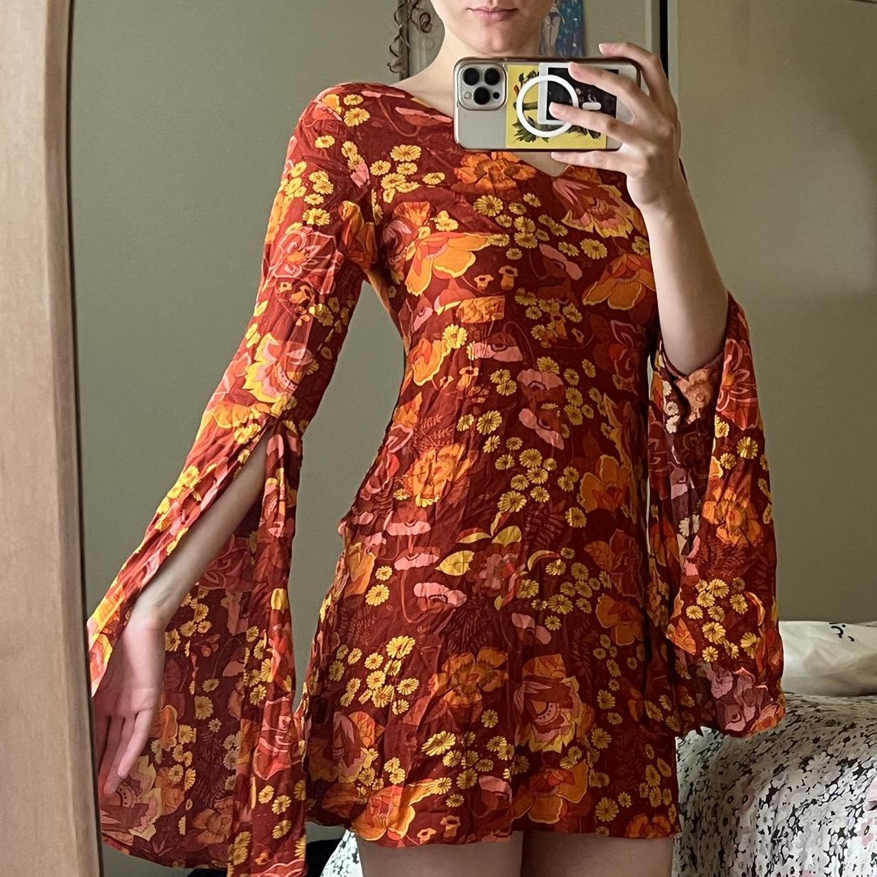 Medium cider flowy flower dress with bell sleeves.... - Depop