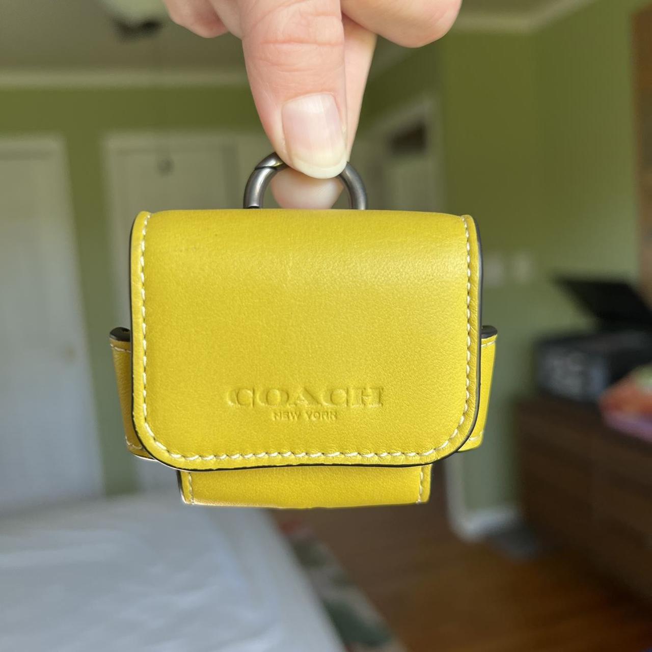 Coach yellow wireless earbud case dark yellow... | Depop