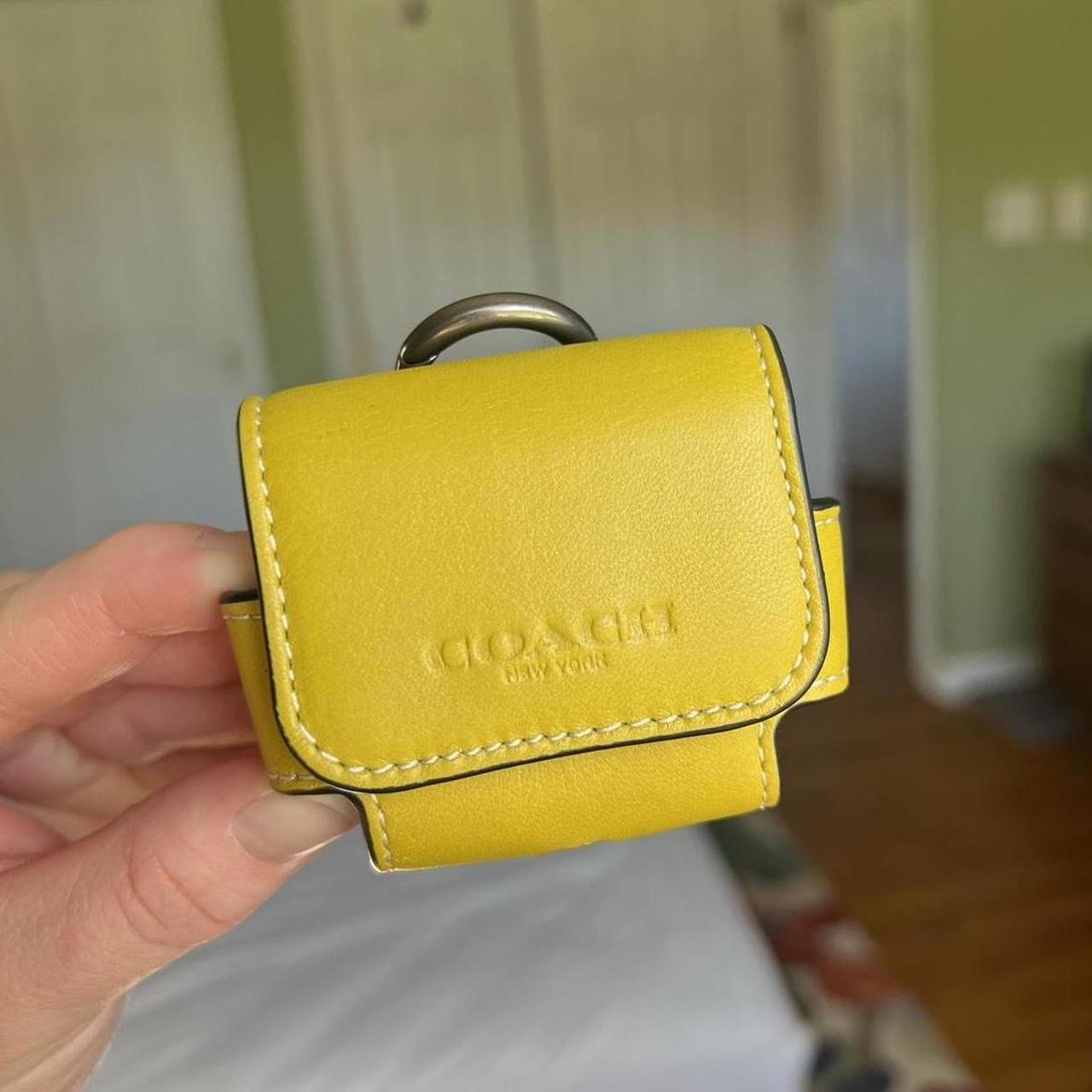 Coach yellow wireless earbud case dark yellow... | Depop