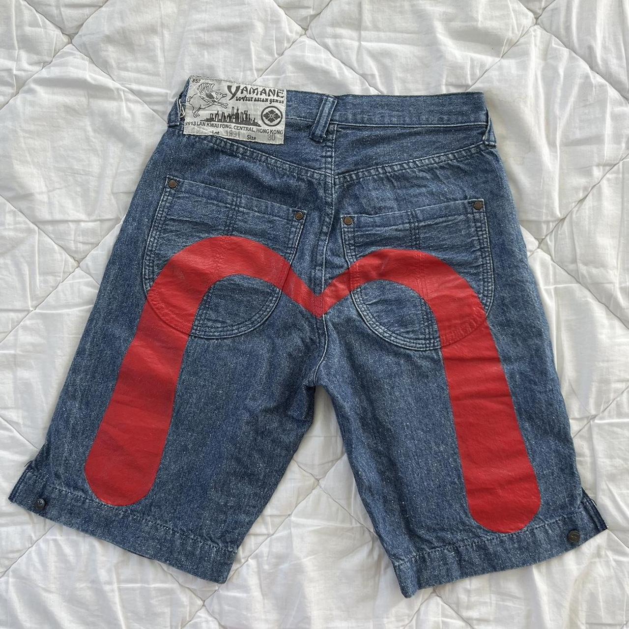 Evisu jean shorts blue wash with red detail size 30... - Depop