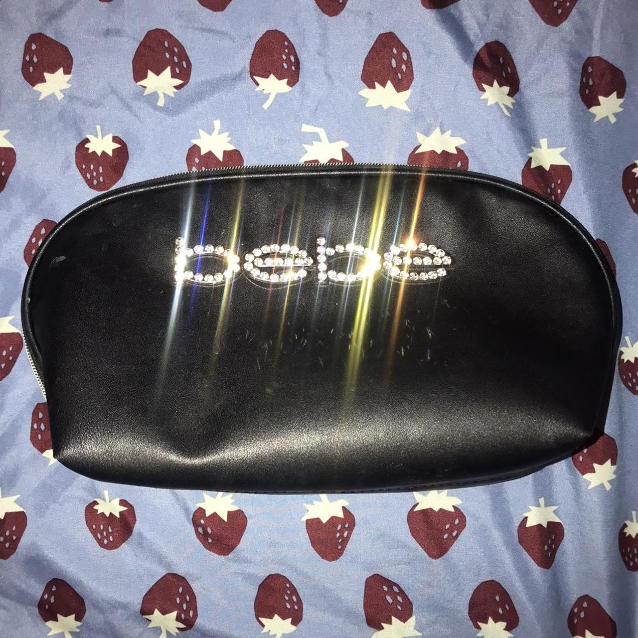 small #bebe makeup pouch, has a few stains inside... - Depop