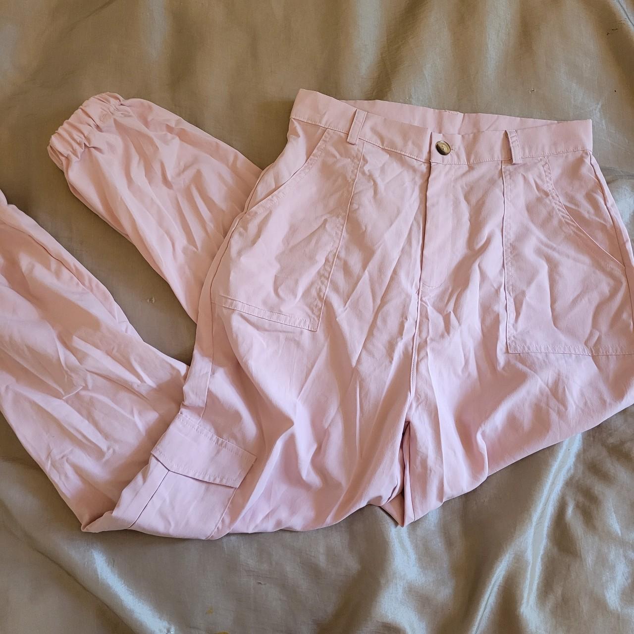 Light pink cargo pants, cuffed at the bottom. Has... - Depop
