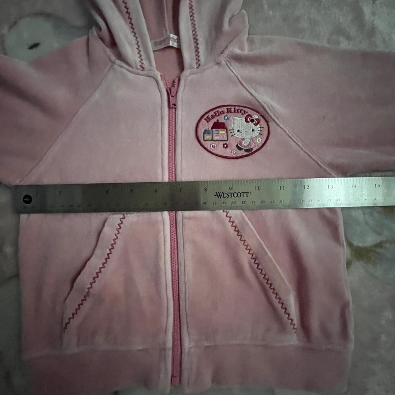 Hello kitty jacket would best fit xxs it’s a size... - Depop