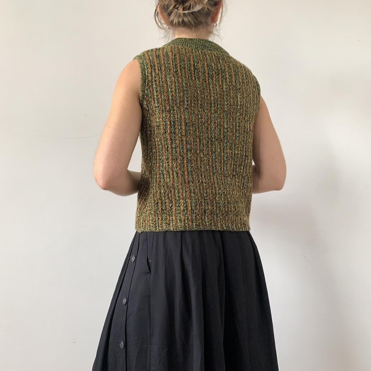 Knitted COS wool sweater vest with high neck Green,... - Depop