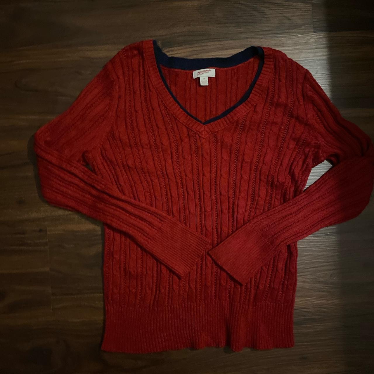 Red V neck sweater with navy blue outline Fits like... - Depop