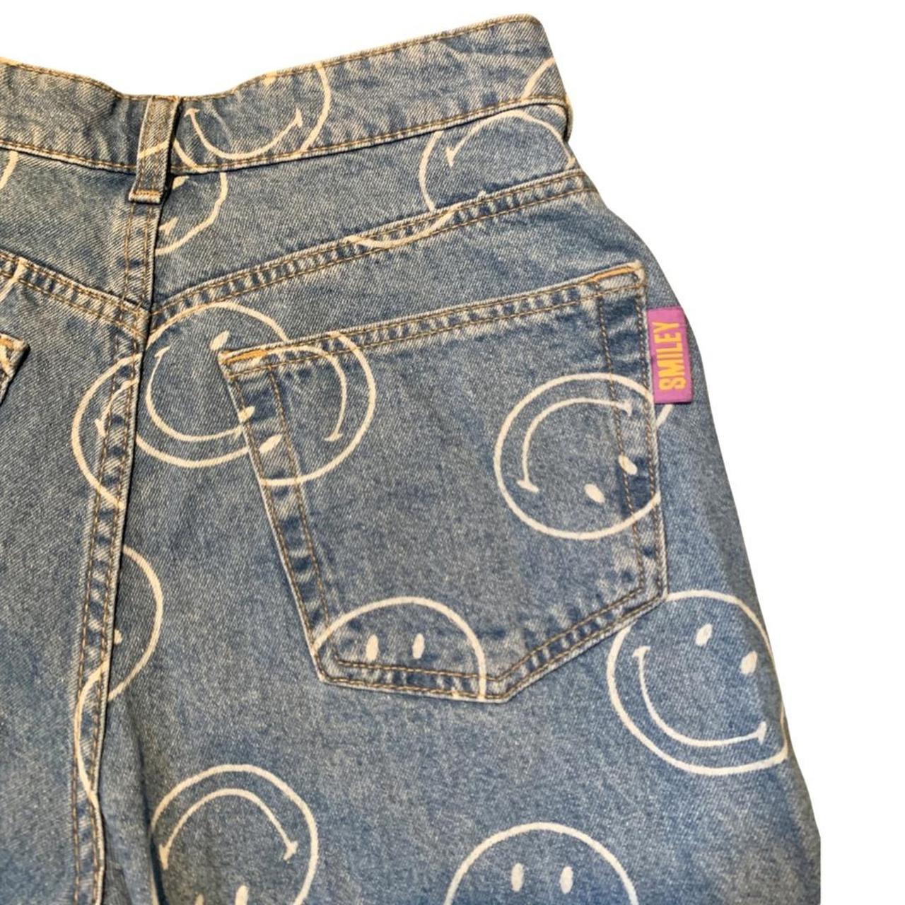 h&m smiley face printed jeans. smiley tag detail on... - Depop