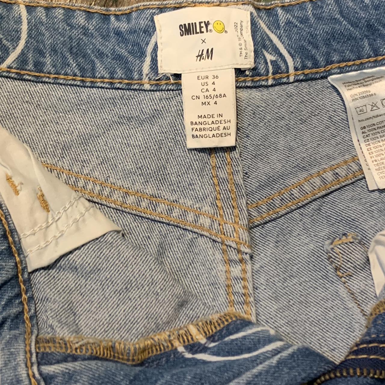 h&m smiley face printed jeans. smiley tag detail on... - Depop