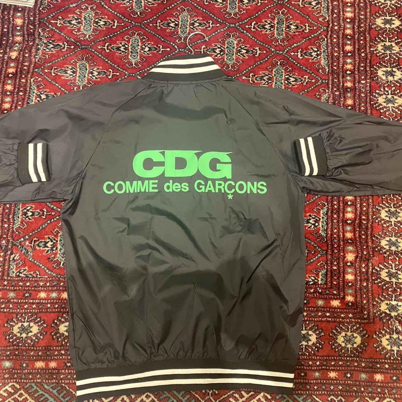 Archive CDG waterproof varsity jacket never worn can... - Depop