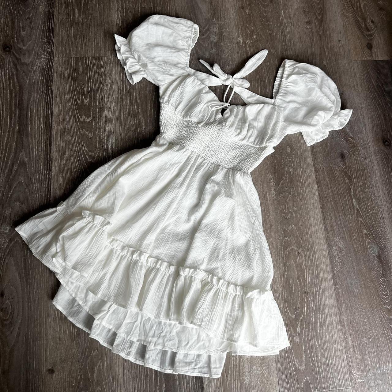 adorable white babydoll dress with ruffles and puffy... - Depop