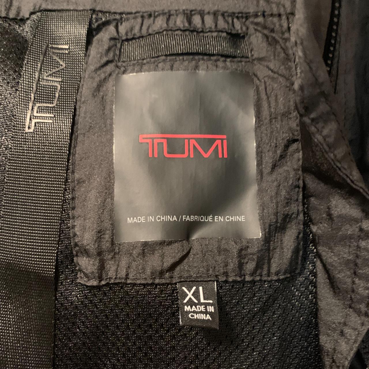 Tumi Pax Black Folding Raincoat / Windbreaker - Depop