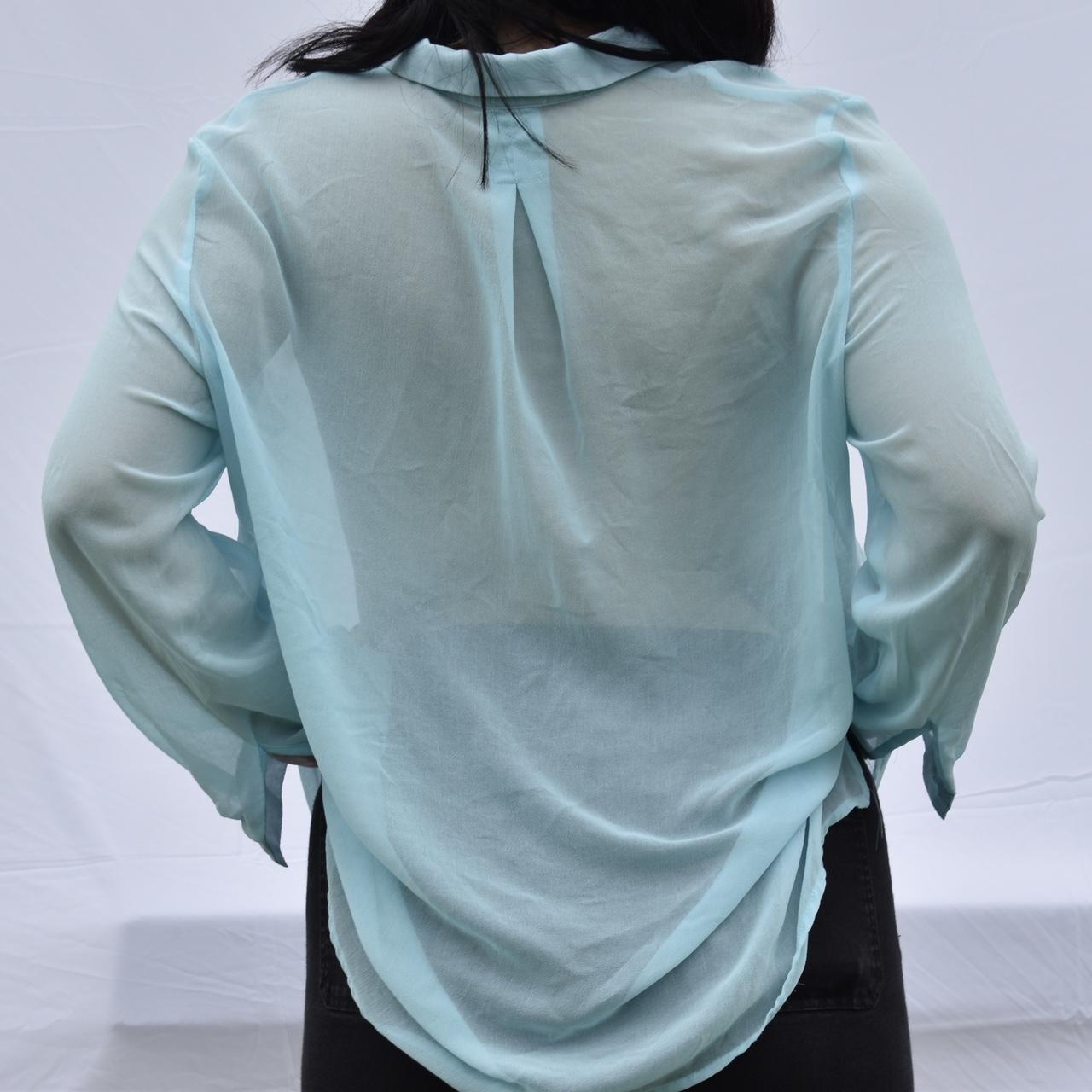 SHEER BLUE BUTTON UP This sheer blouse is a perfect... - Depop