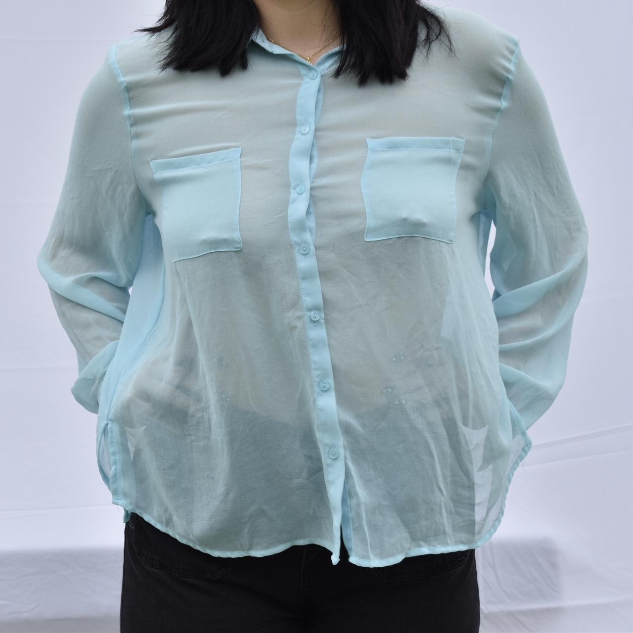 SHEER BLUE BUTTON UP This sheer blouse is a perfect... - Depop